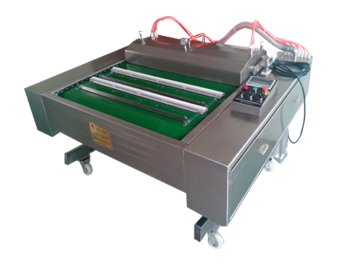 ZX-1000L 连续滚动式真空包装机-北京泽信伟业机械设备有限公司